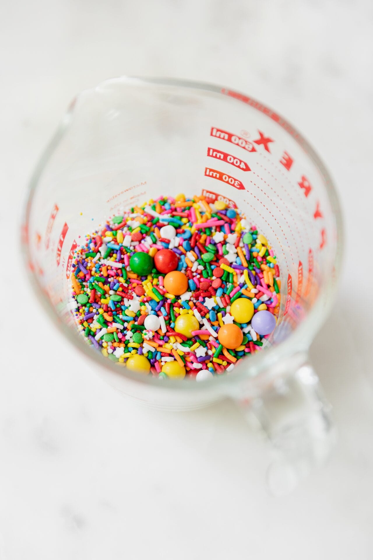 HOW TO MAKE A RAINBOW EXPLOSION CAKE | Pretty Together