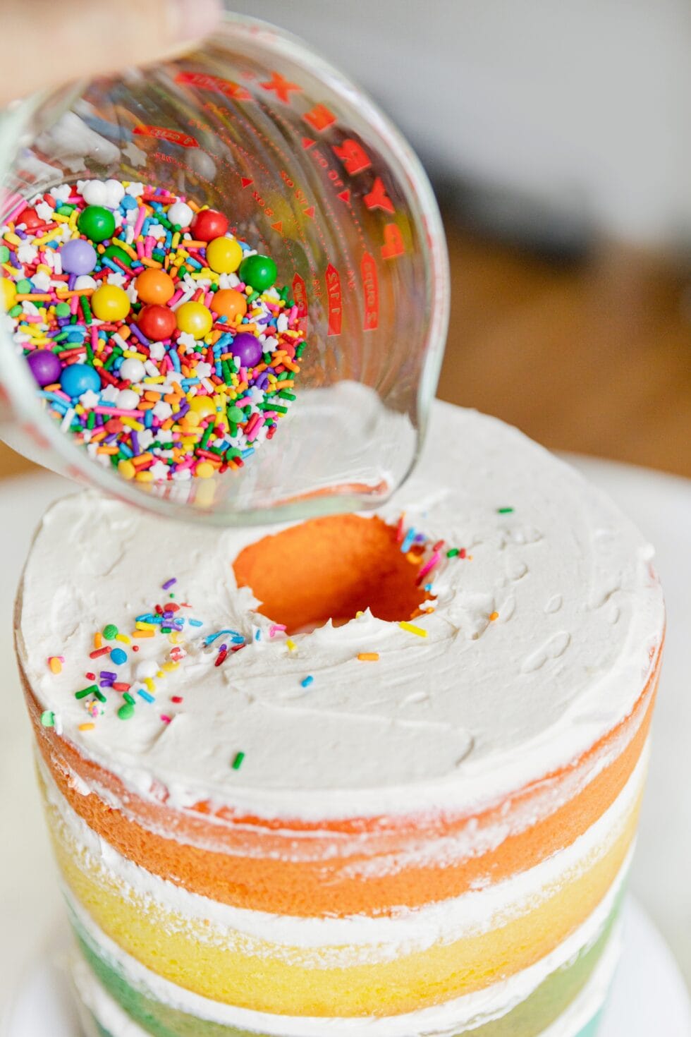 HOW TO MAKE A RAINBOW EXPLOSION CAKE | Pretty Together