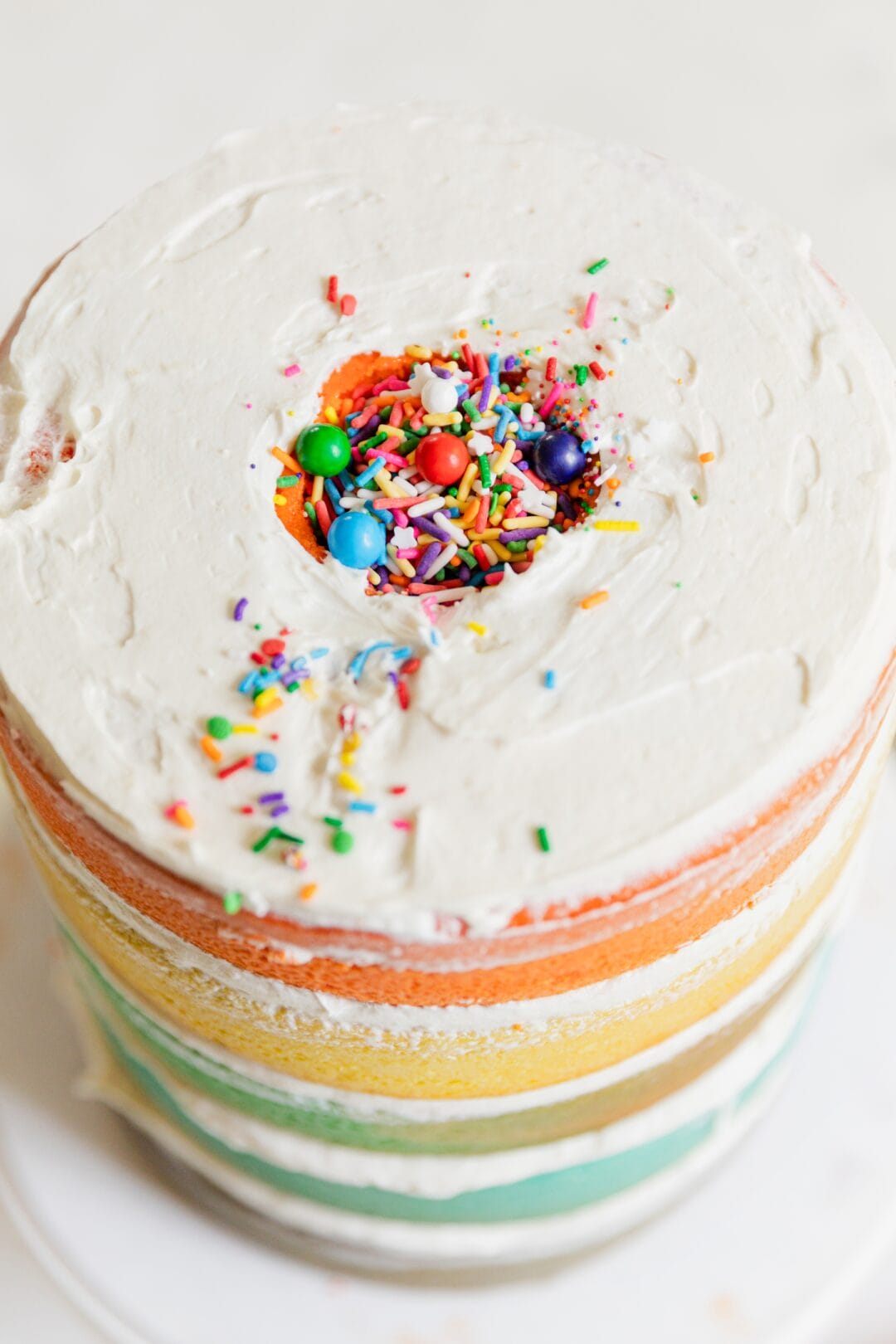 HOW TO MAKE A RAINBOW EXPLOSION CAKE | Pretty Together