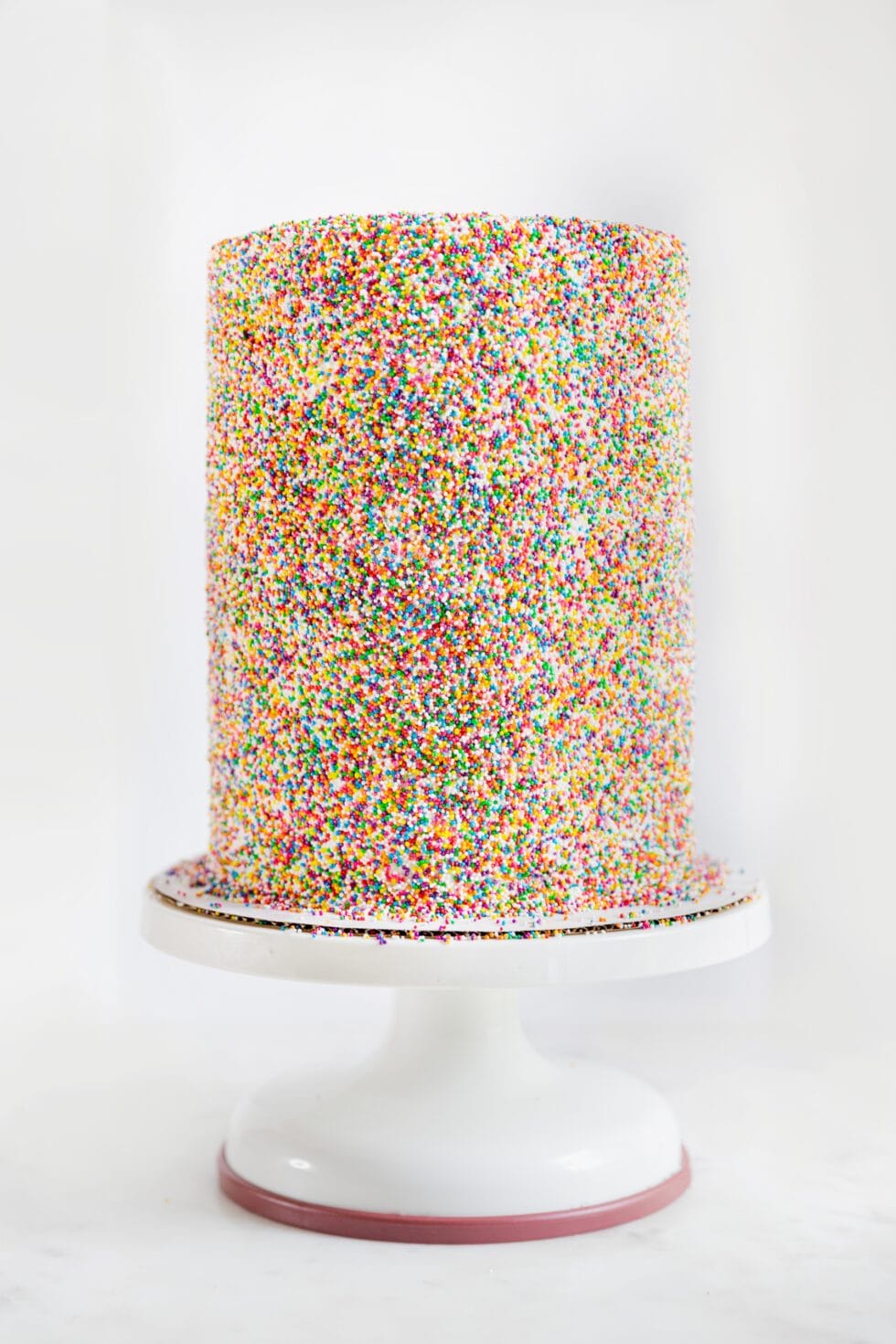 HOW TO MAKE A RAINBOW EXPLOSION CAKE | Pretty Together