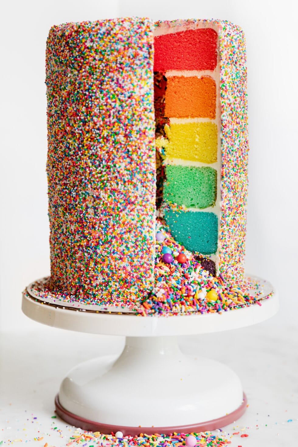 HOW TO MAKE A RAINBOW EXPLOSION CAKE | Pretty Together